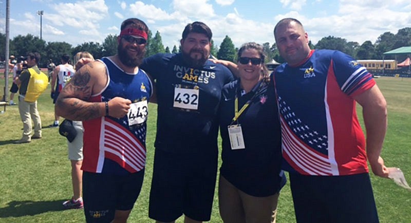 To aid wounded warriors, former Duck throws more than her O | OregonNews